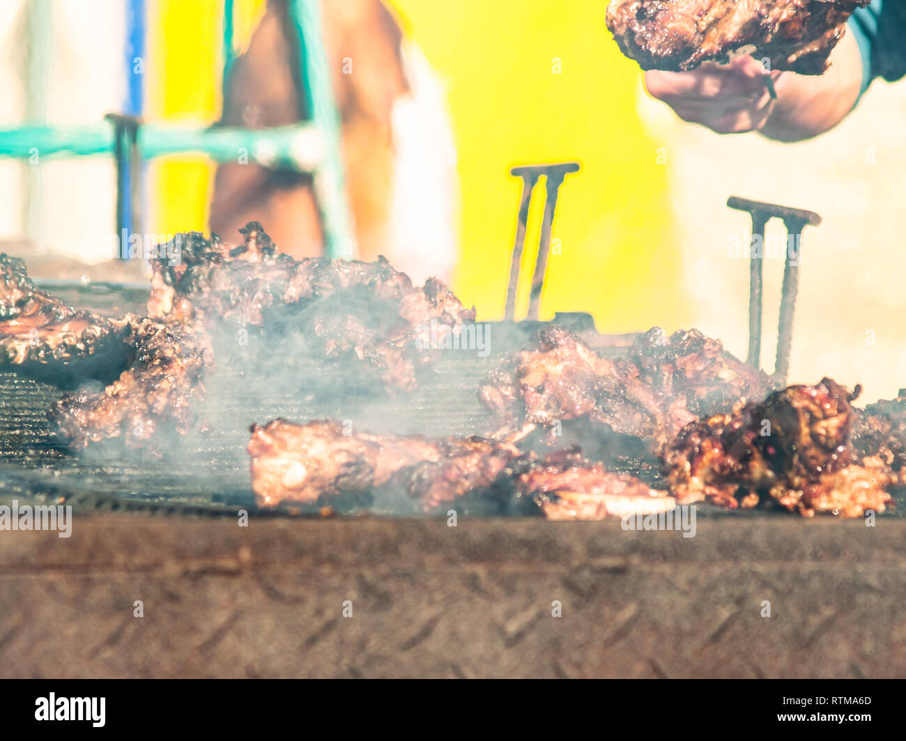 Cooking the meat on the barbecue hi-res stock photography and images ...
