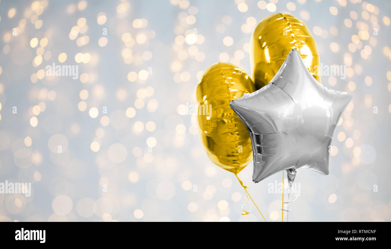 Silver and gold balloons hi-res stock photography and images - Alamy