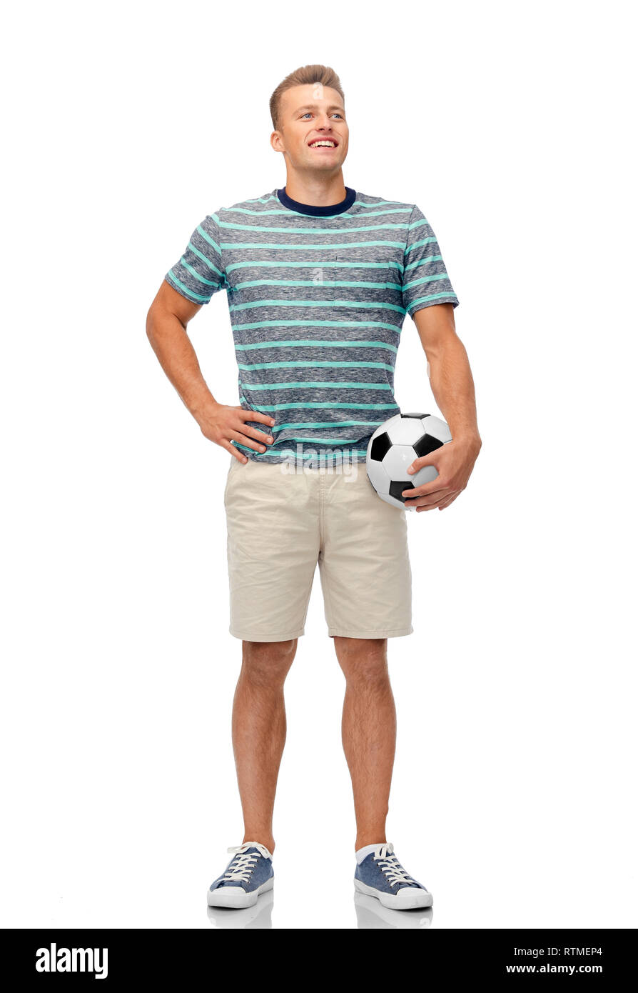 smiling young man with soccer ball Stock Photo - Alamy