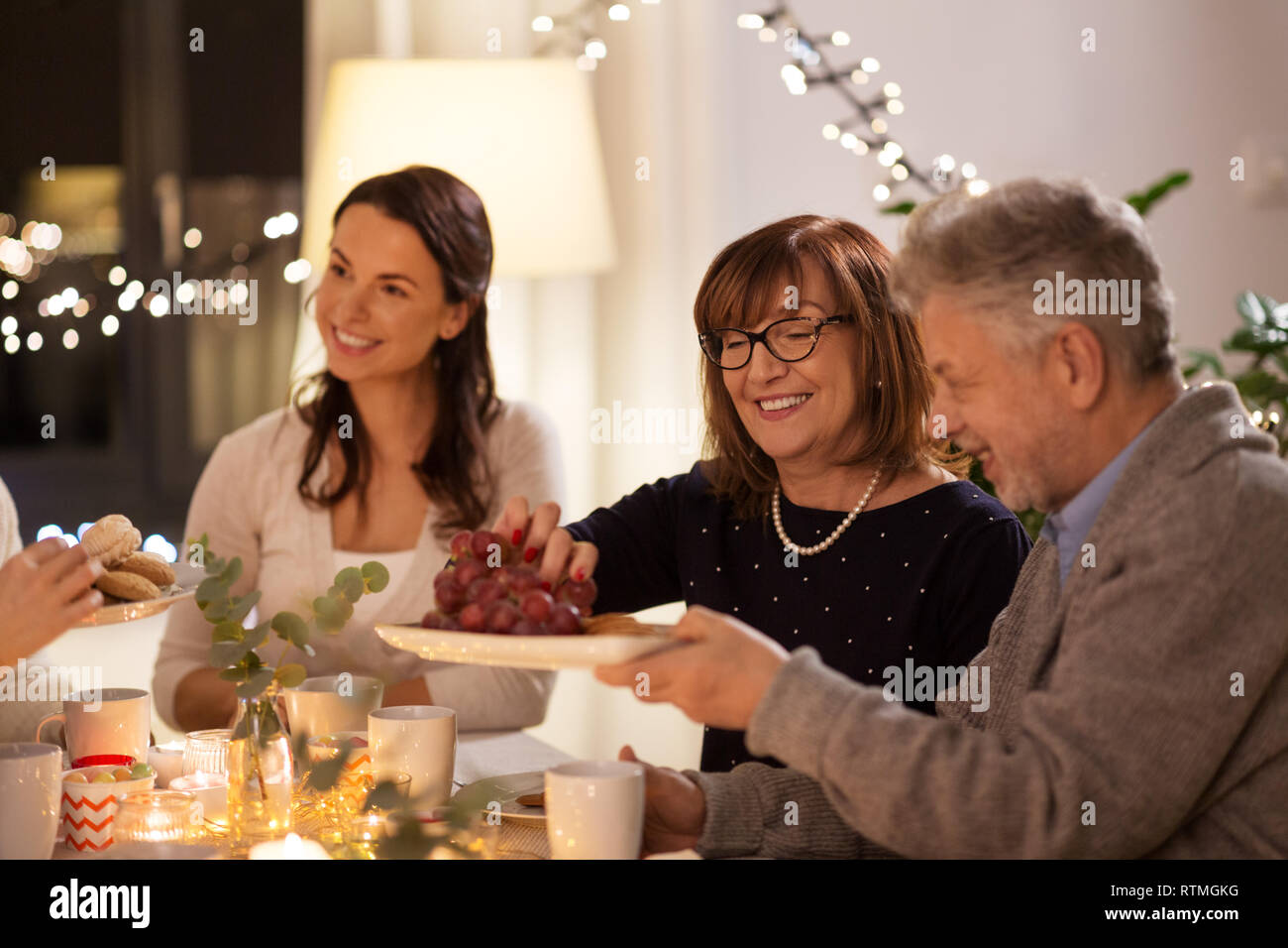 happy family having tea party at home Stock Photo - Alamy