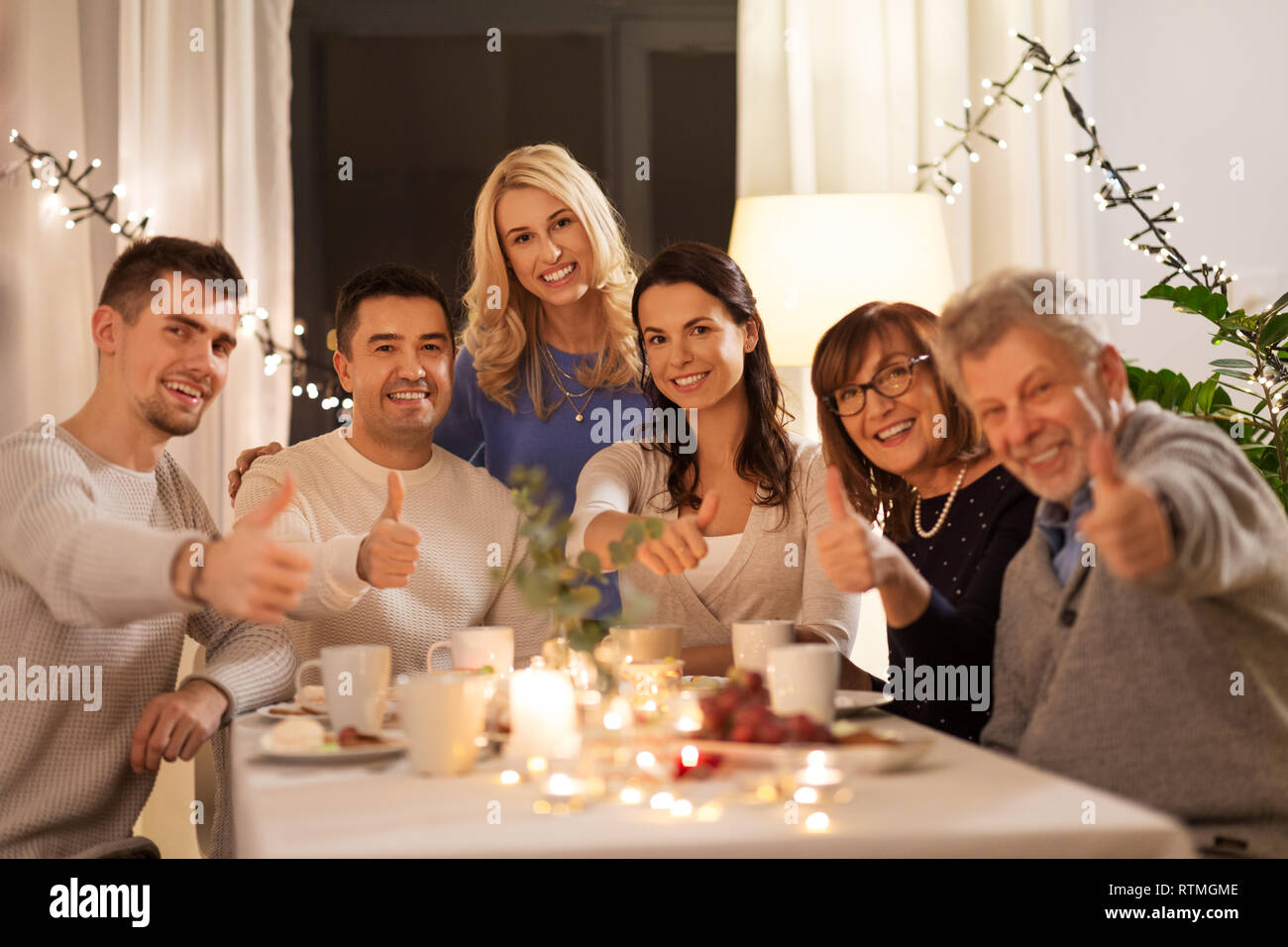 happy family having tea party at home Stock Photo - Alamy