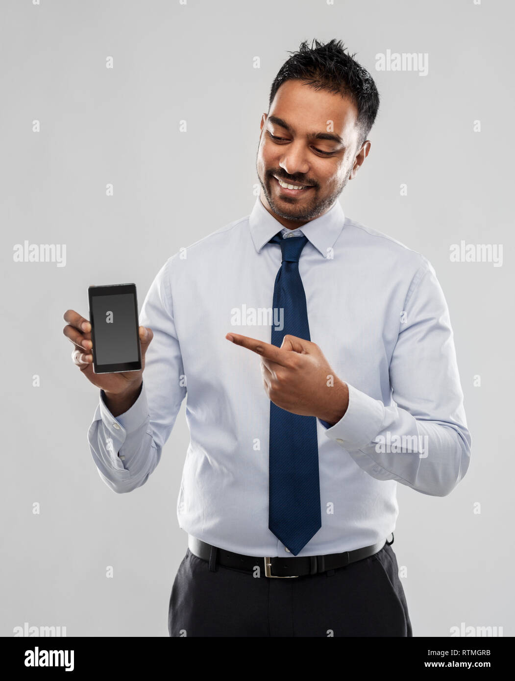 indian businessman with smartphone Stock Photo - Alamy