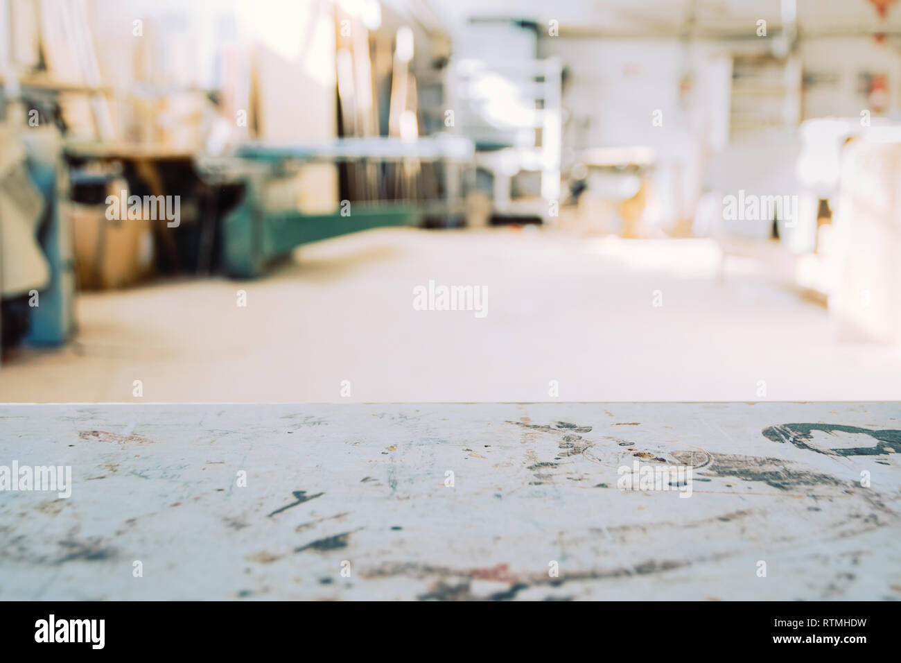 Blurred background of carpentry workshop. Machinery background and ...