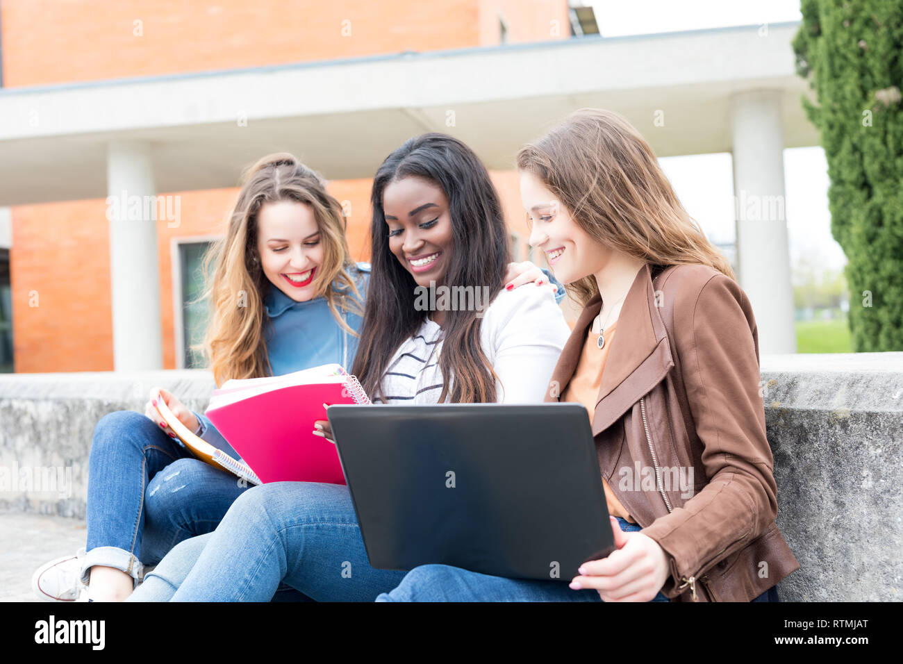 Group multi ethnic young students at the university campus Stock Photo ...