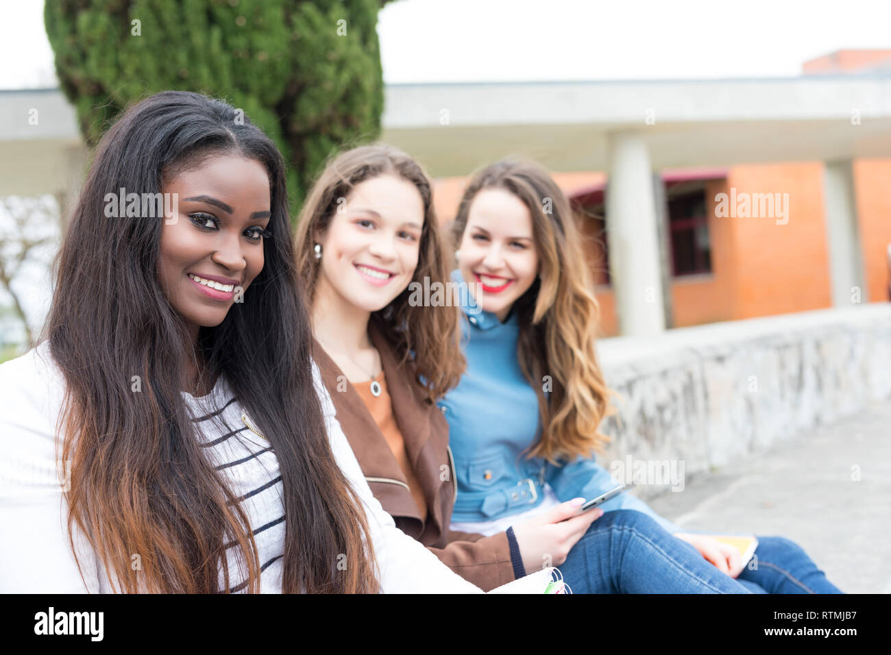 Group multi ethnic young students at the university campus Stock Photo ...