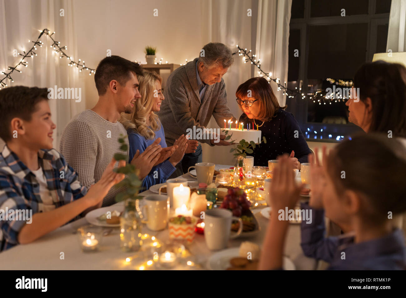 happy family having birthday party at home Stock Photo - Alamy