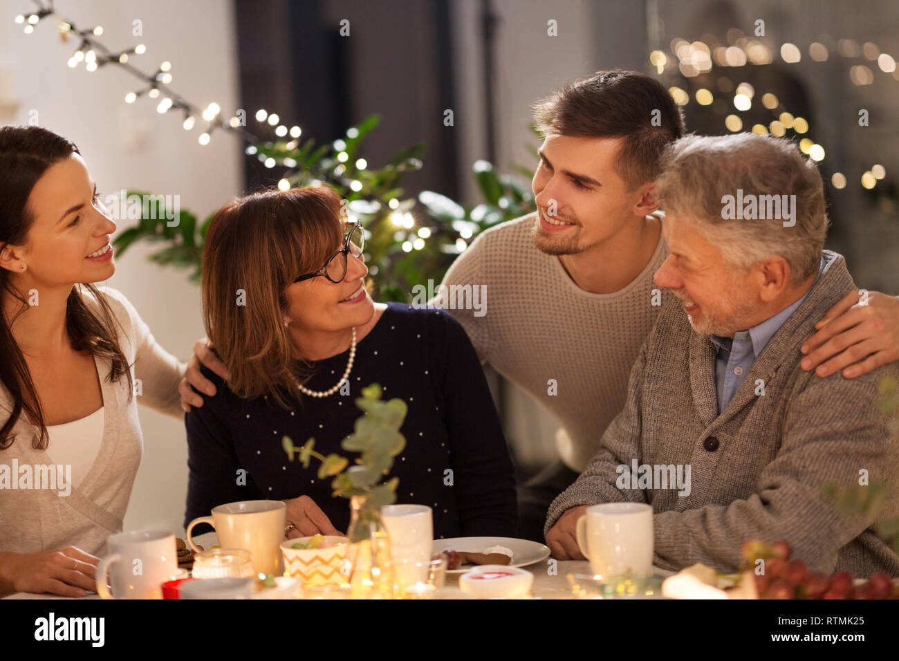 happy family having tea party at home Stock Photo - Alamy