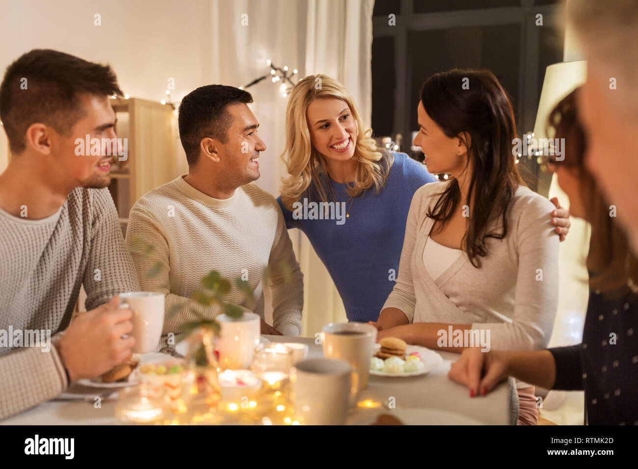 happy family having tea party at home Stock Photo - Alamy