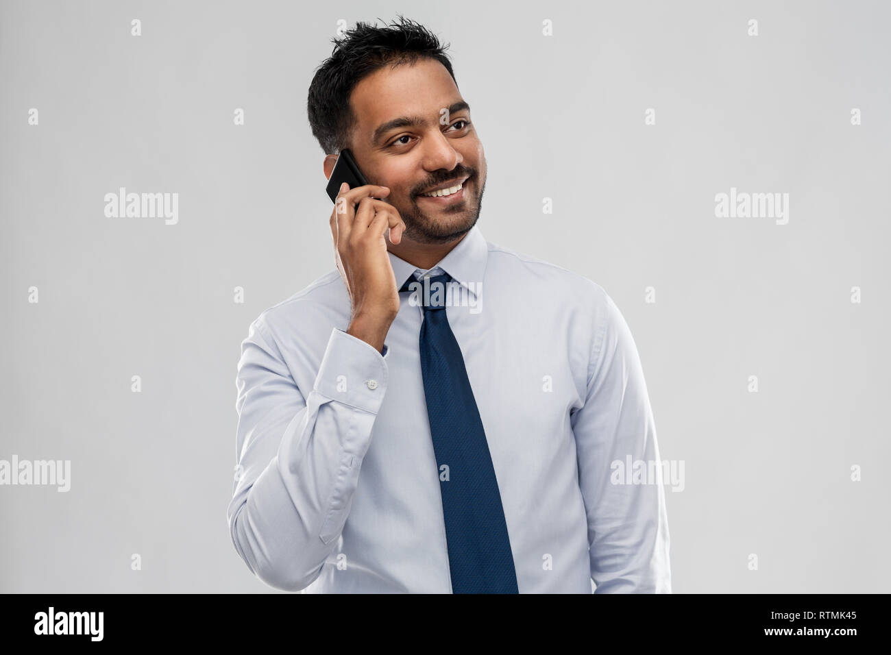 Cheerful young businessman calling hi-res stock photography and images ...