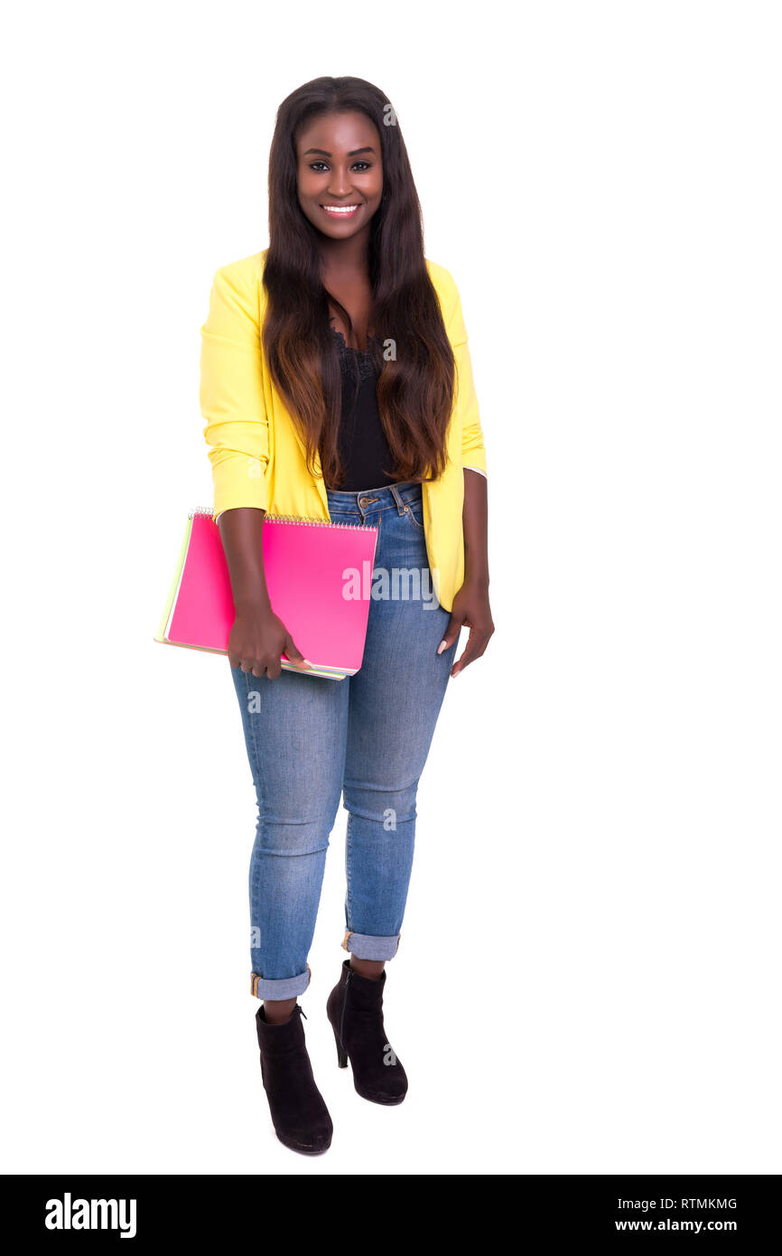 Beautiful african student woman posing isolated over white background ...