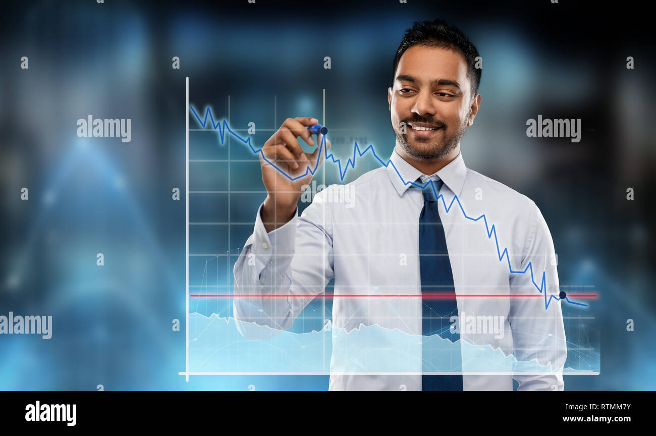 businessman with marker drawing chart at office Stock Photo - Alamy