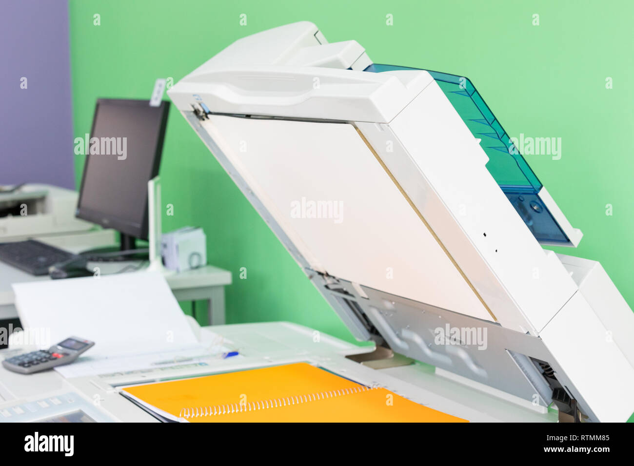 Detail of a modern digital printer of a copy center Stock Photo - Alamy