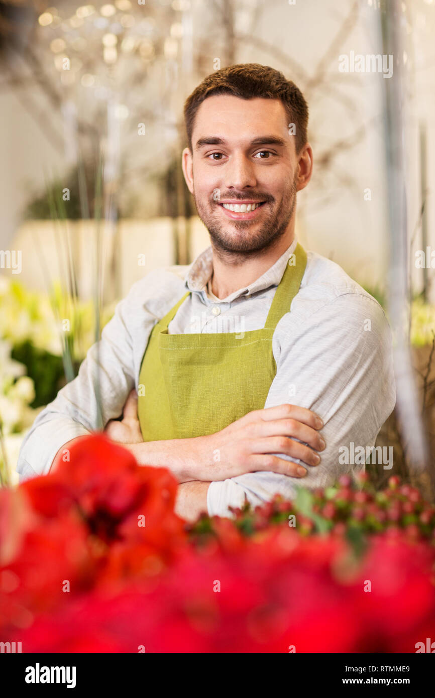 florist man or seller at flower shop counter Stock Photo - Alamy