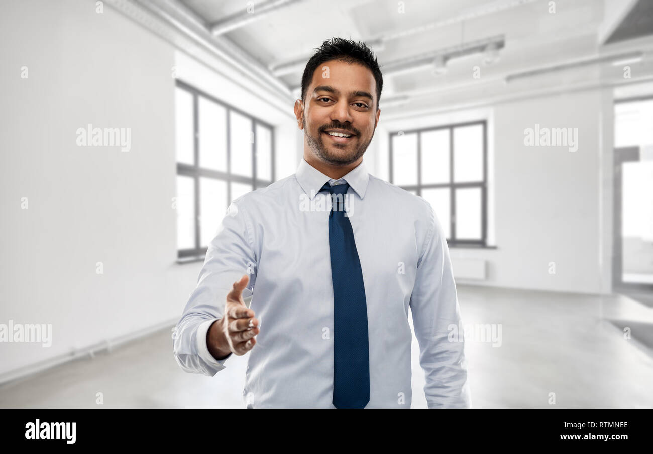 Businessman realtor giving hand hi-res stock photography and images - Alamy