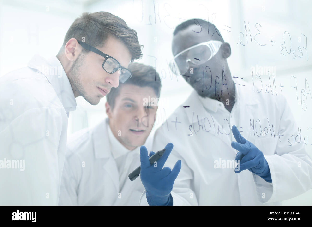 group of scientists talking in the laboratory Stock Photo - Alamy