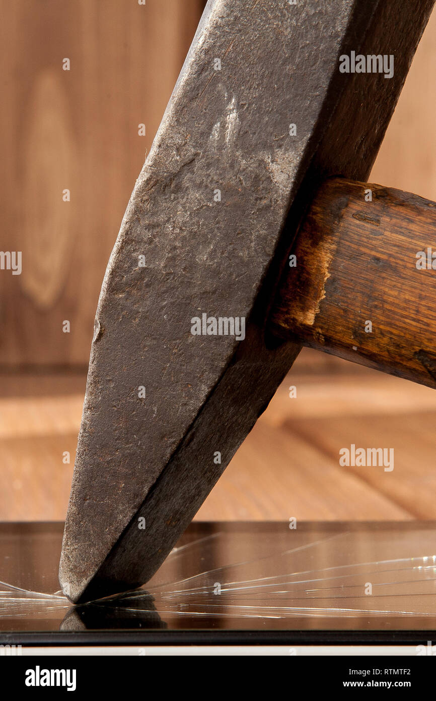 Smashed Screen Vandalised Broken Glass Close Up With Hammer Stock Photo ...