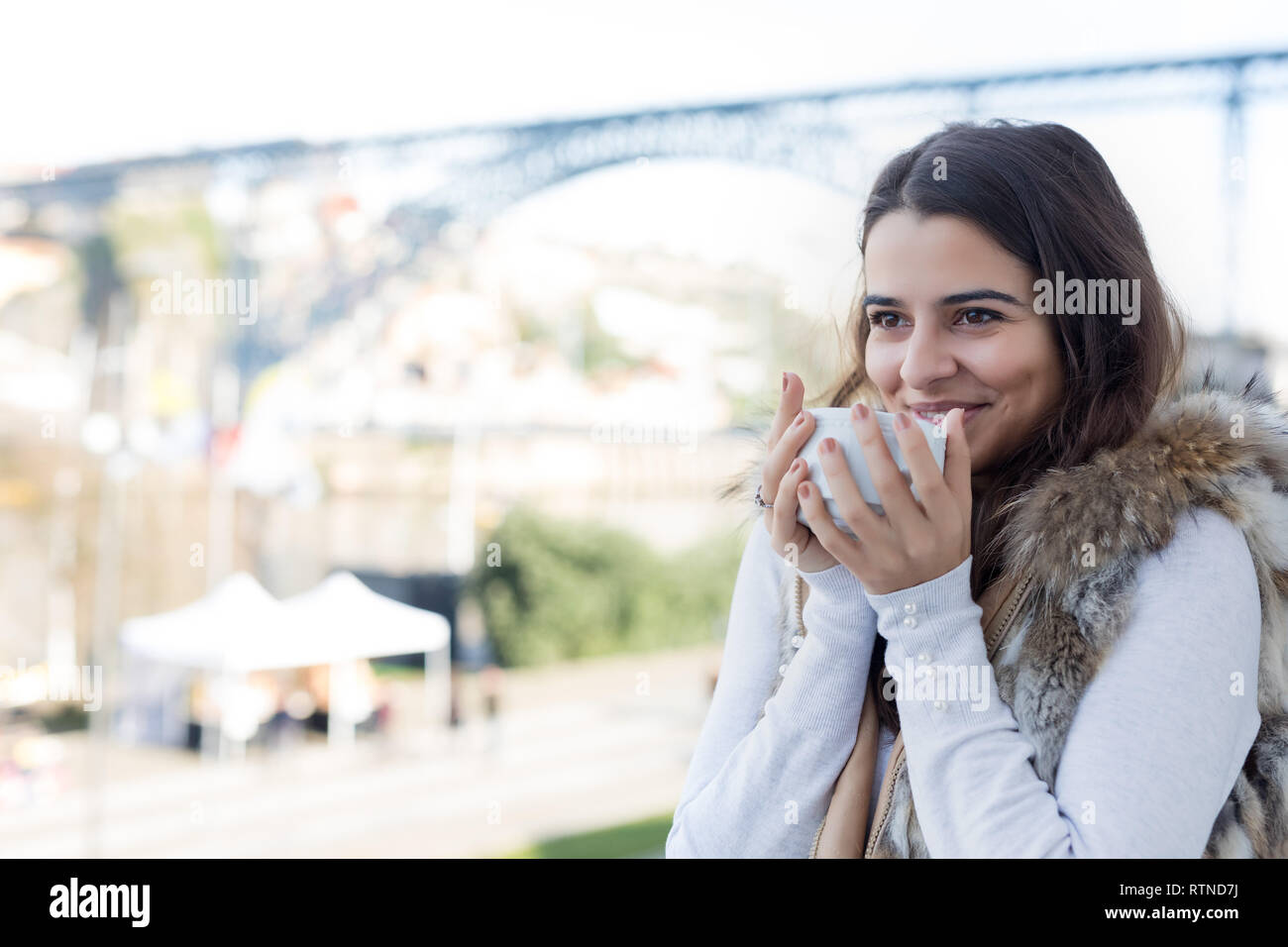 Woman relaxing at balcony enjoying sunrise. Good morning Stock Photo ...