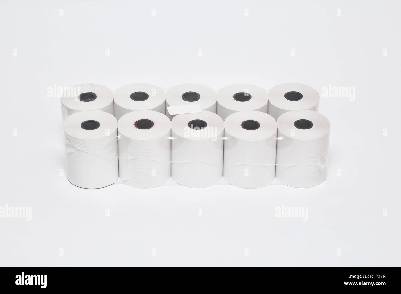 Roll of cash register tape isolated on soft gray background.High ...