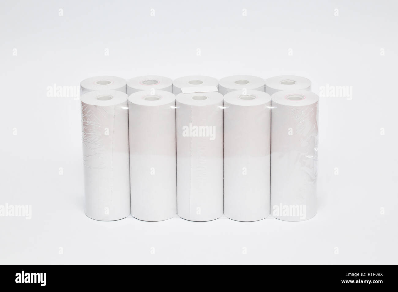 Roll of cash register tape isolated on soft gray background.High ...