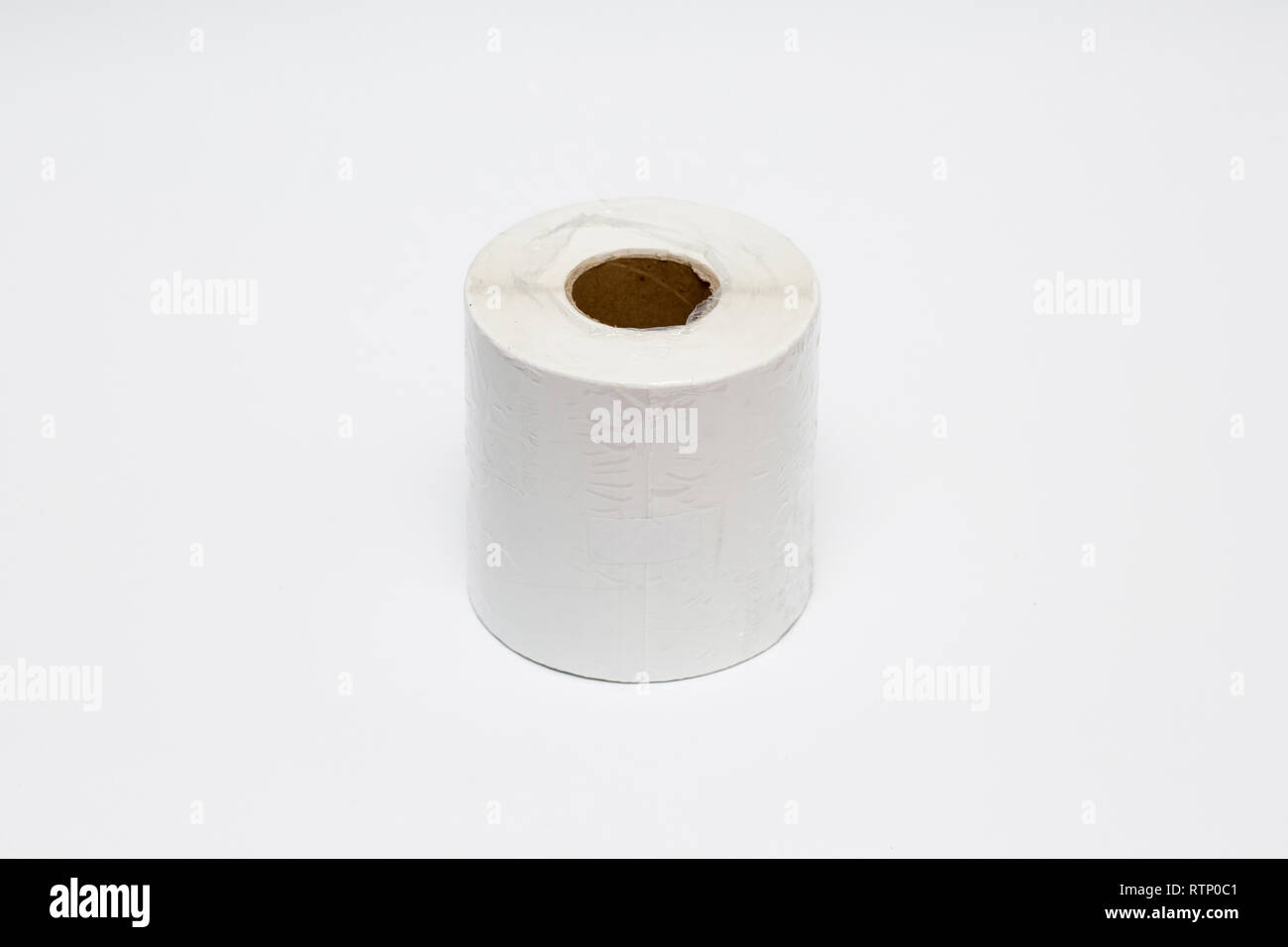 Roll of cash register tape isolated on soft gray background.High ...