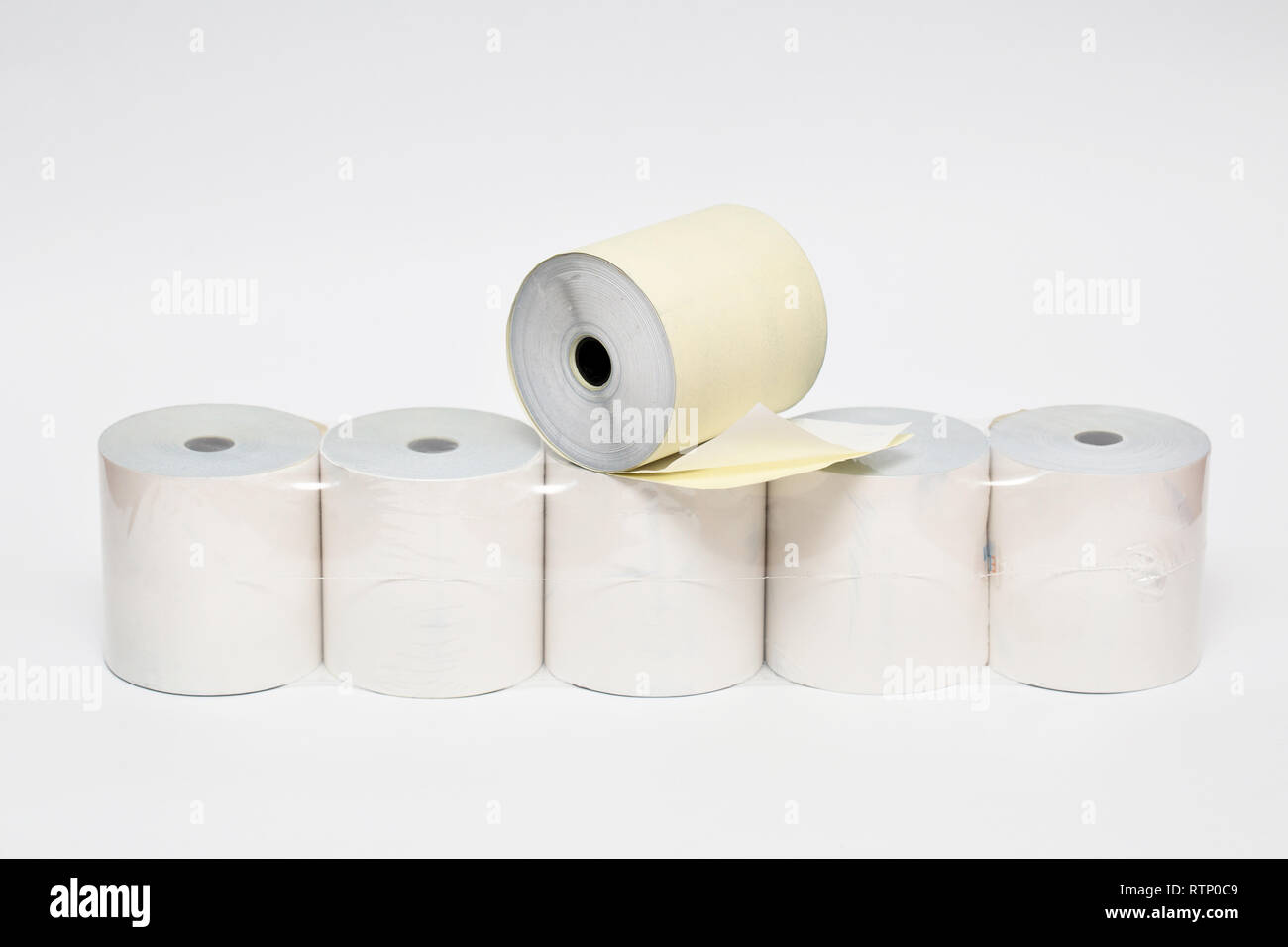 Roll of cash register tape isolated on soft gray background.High ...
