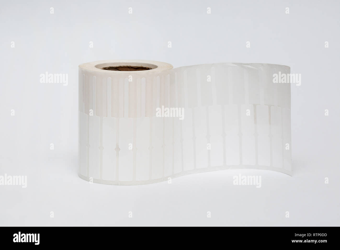 Roll of cash register tape isolated on soft gray background.High ...