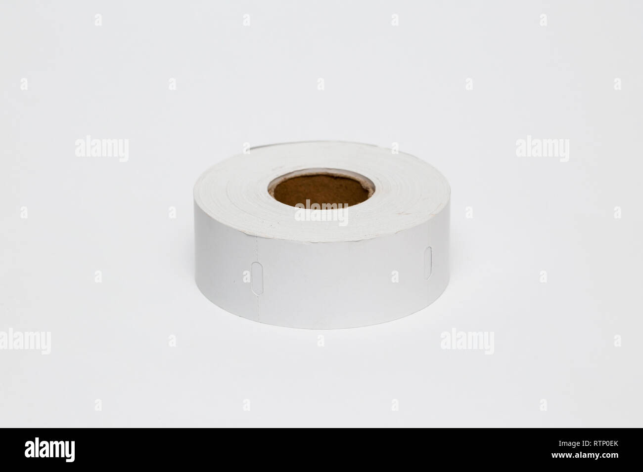 Roll of cash register tape isolated on soft gray background.High ...