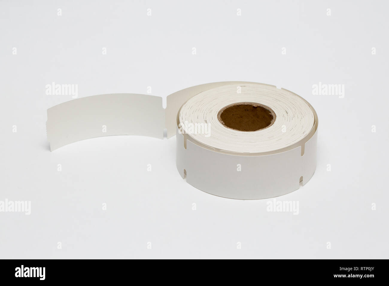 Roll of cash register tape isolated on soft gray background.High ...