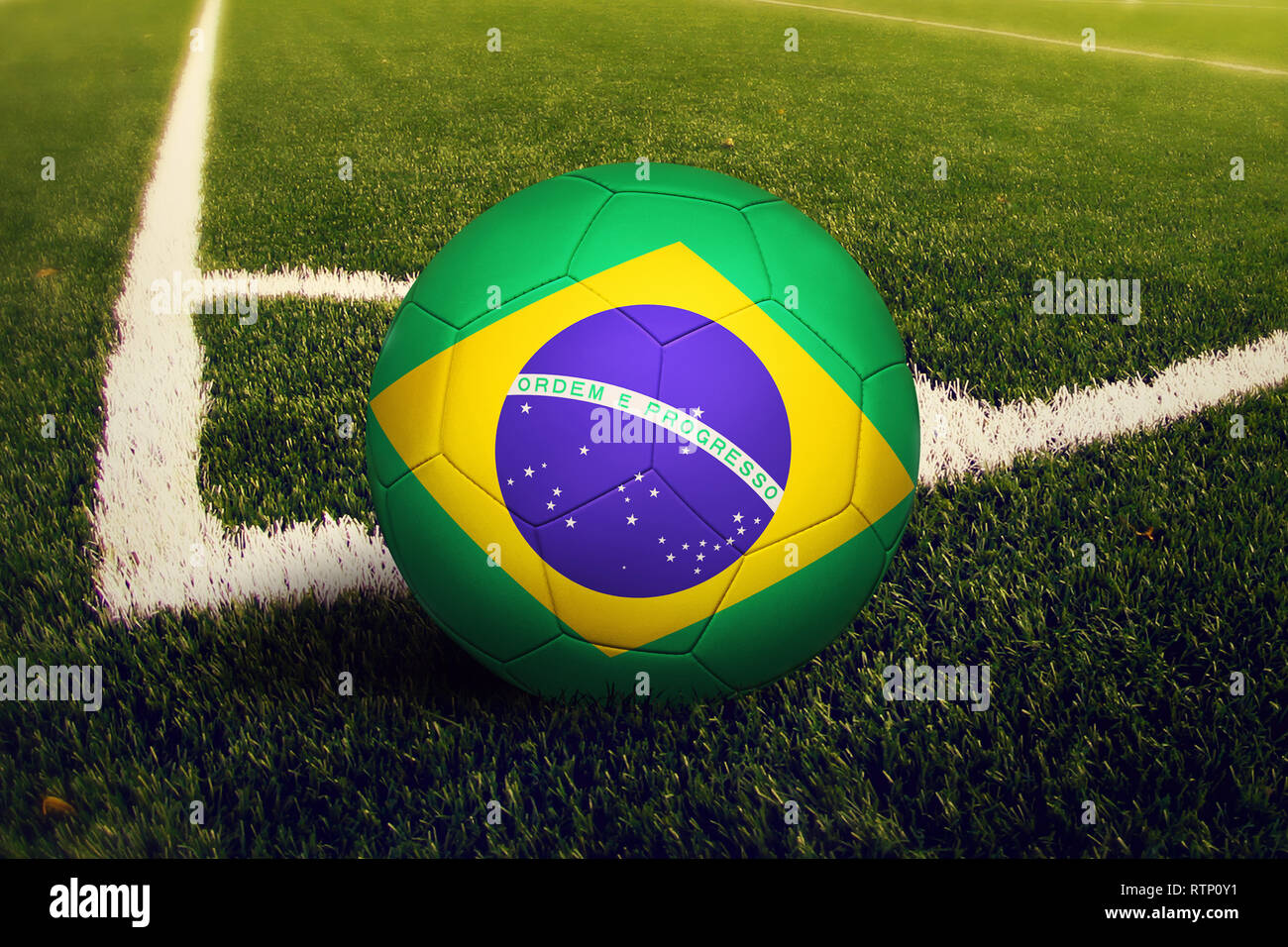 Brazil ball on corner kick position, soccer field background. National ...