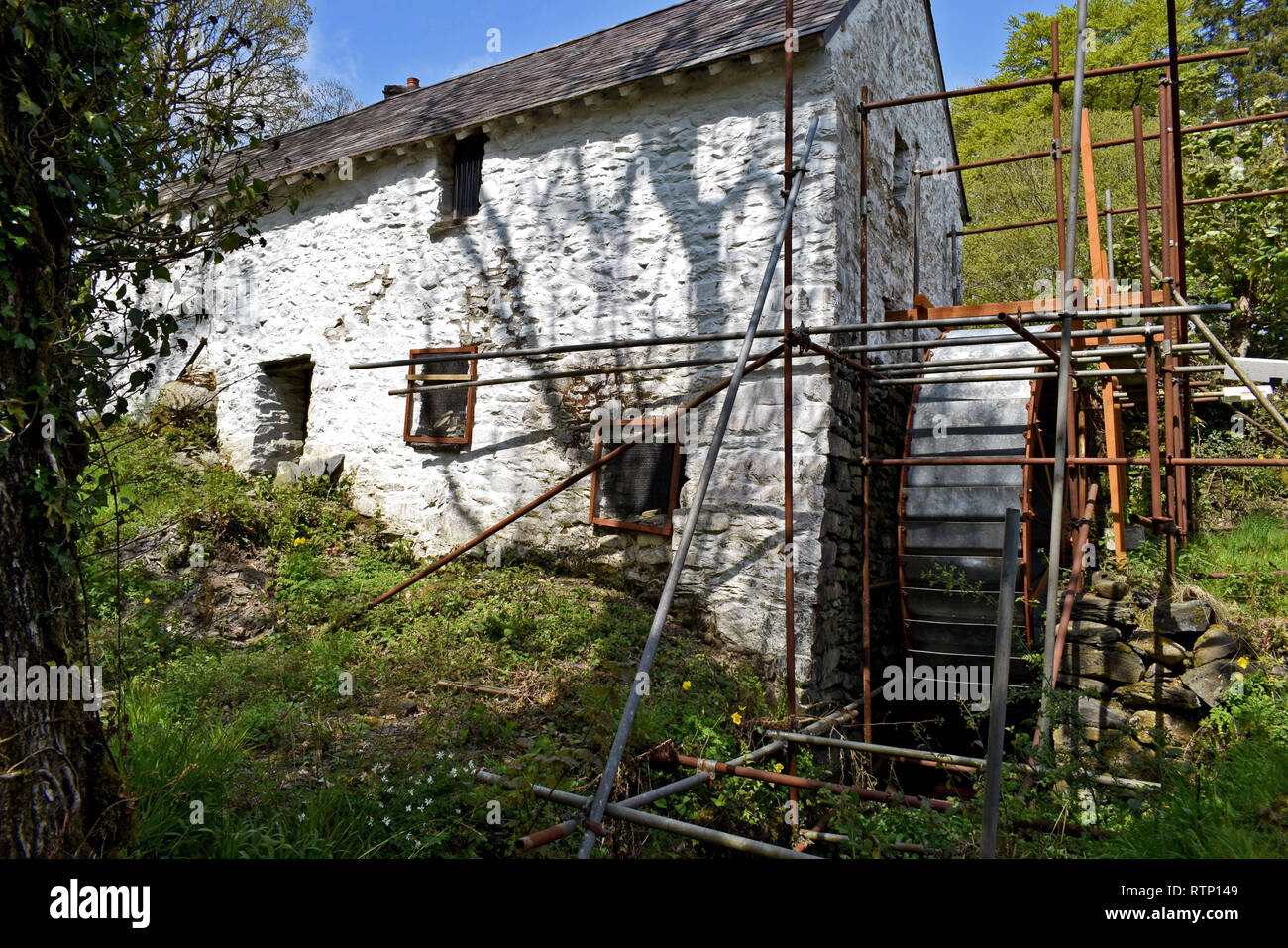 A old white mill being renovated in the Welsh countryside Stock Photo ...