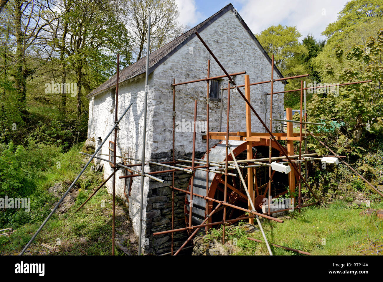 A old white mill being renovated in the Welsh countryside Stock Photo ...