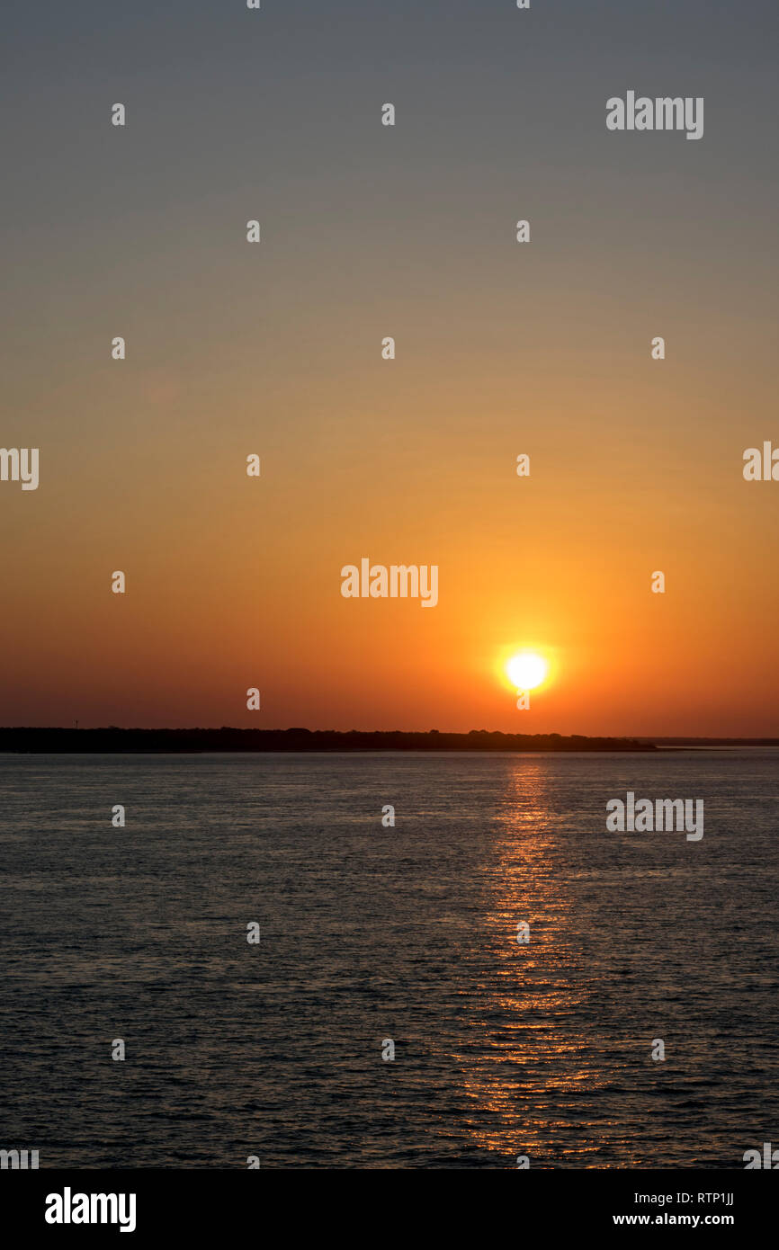 Sunset as seen from ship departing the Port of Darwin, Northern ...