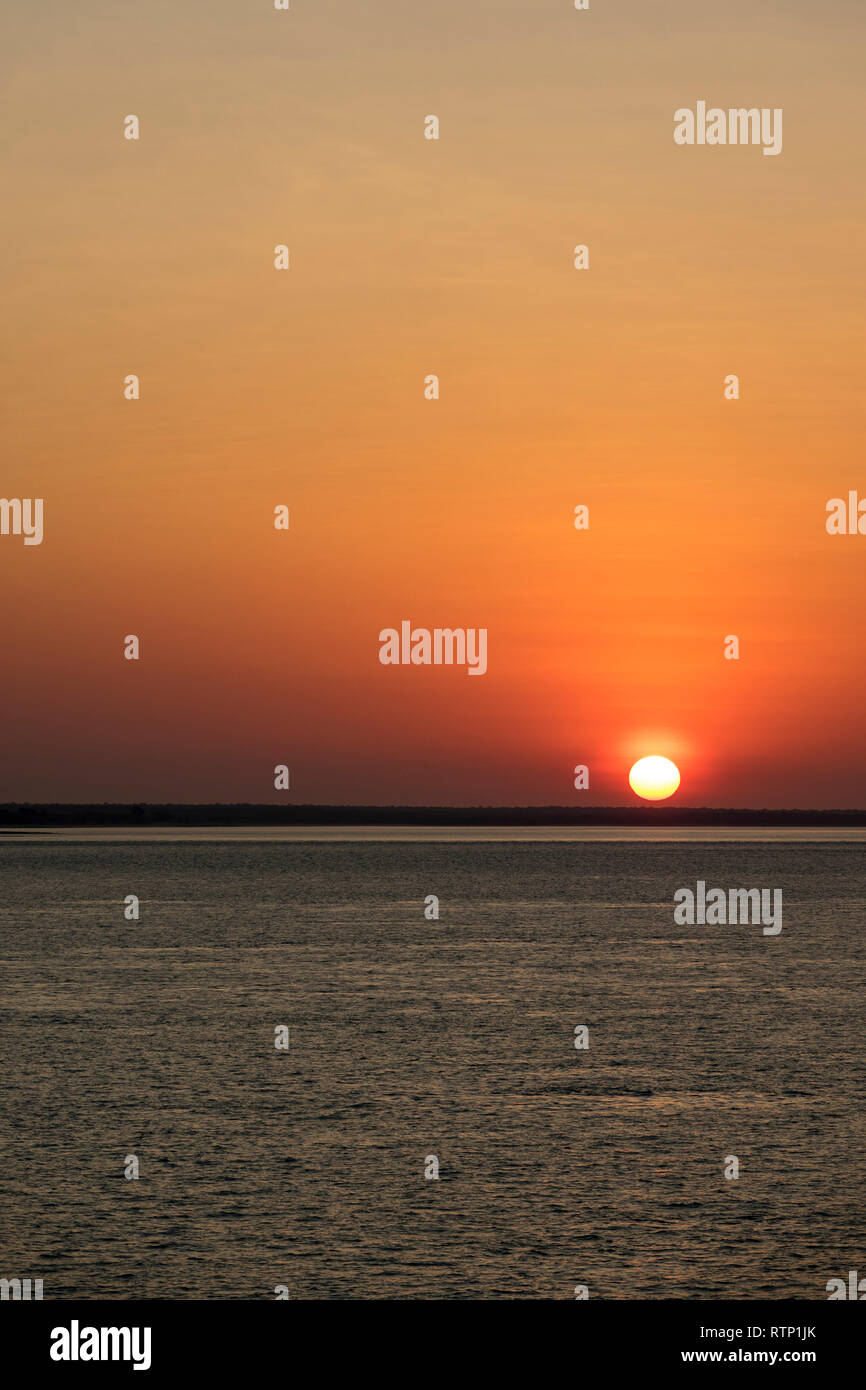 Sunset as seen from ship departing the Port of Darwin, Northern ...
