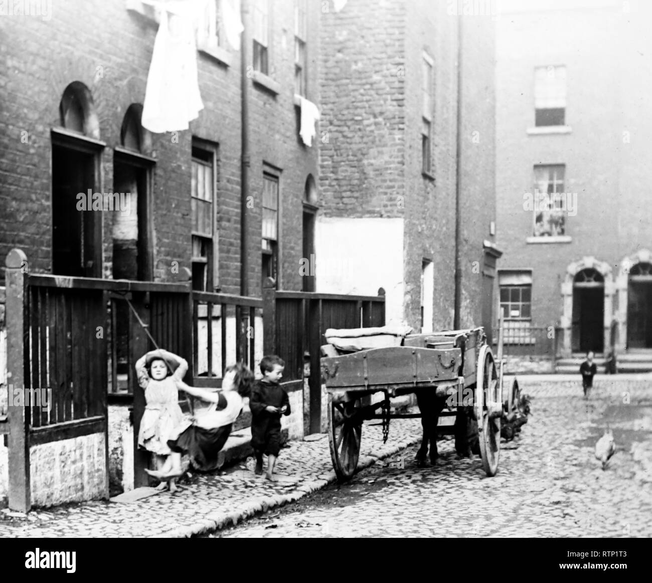Children playing in Dublin, Victorian period Stock Photo - Alamy