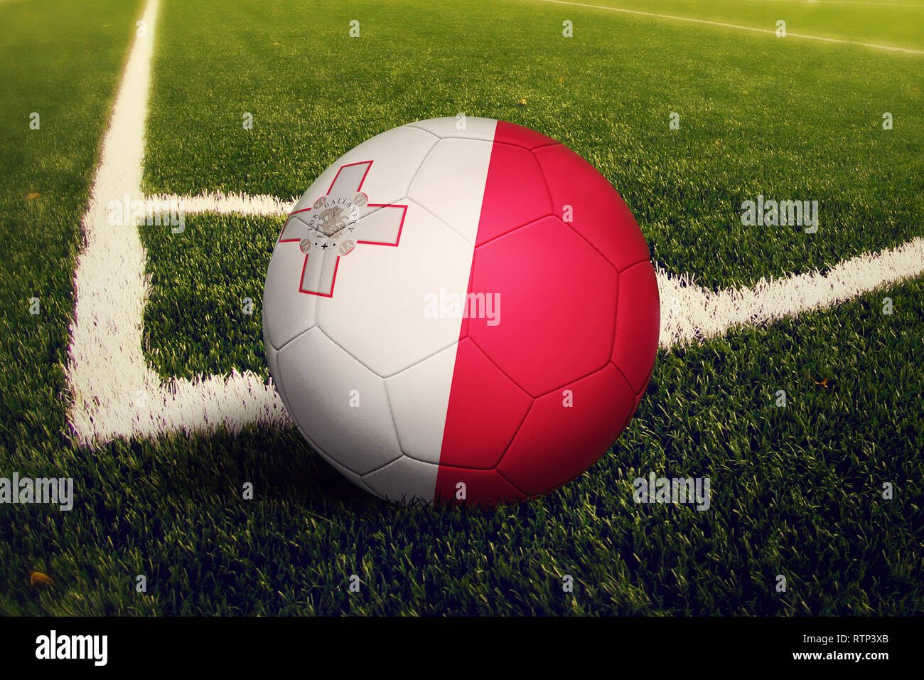 Malta ball on corner kick position, soccer field background. National ...
