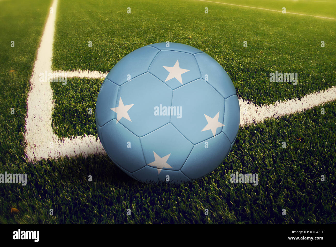 Micronesia ball on corner kick position, soccer field background ...
