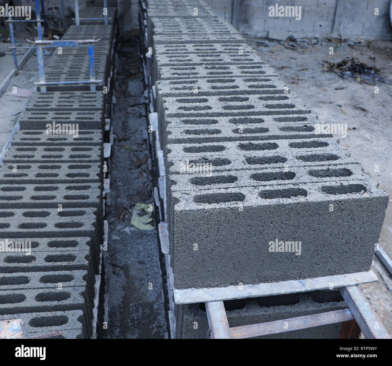 Stacking of concrete blocks laying on the floor Stock Photo - Alamy