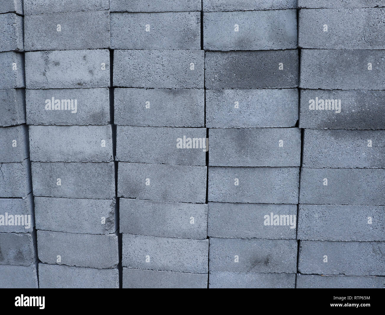 Stacking of concrete blocks laying on the floor Stock Photo - Alamy