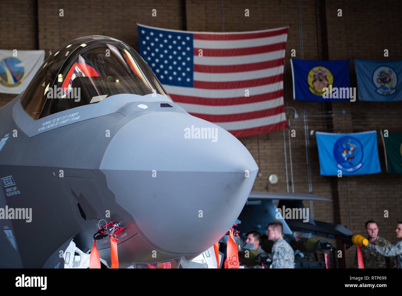 The F-35A Lightning II sits in a hangar loaded with dummy external ...