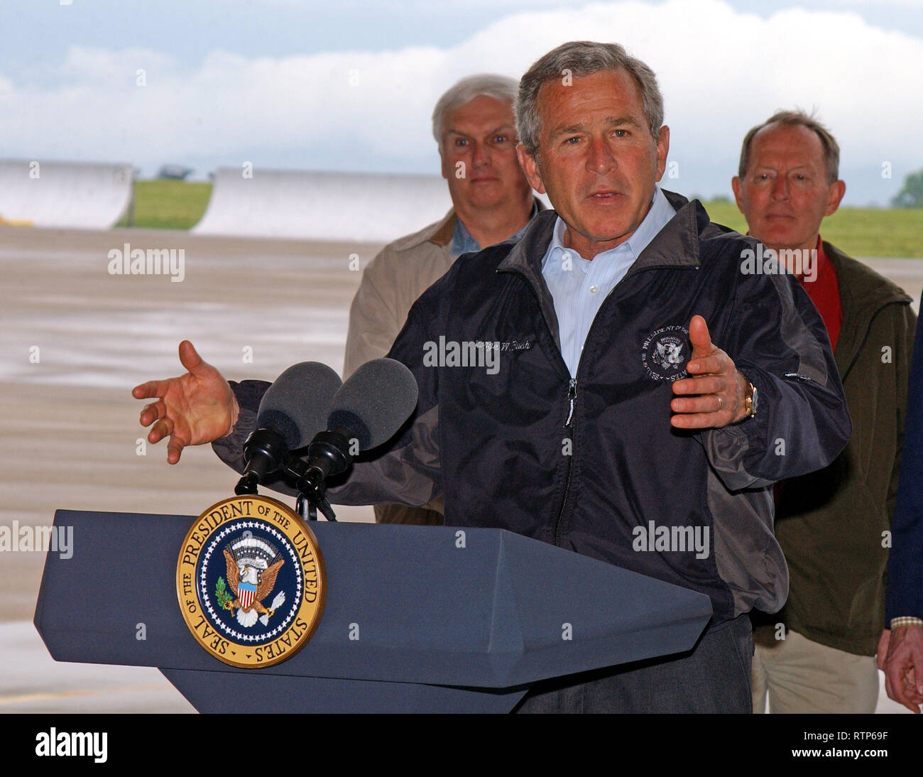President George W. Bush speaks to military members as Congressman Jim ...
