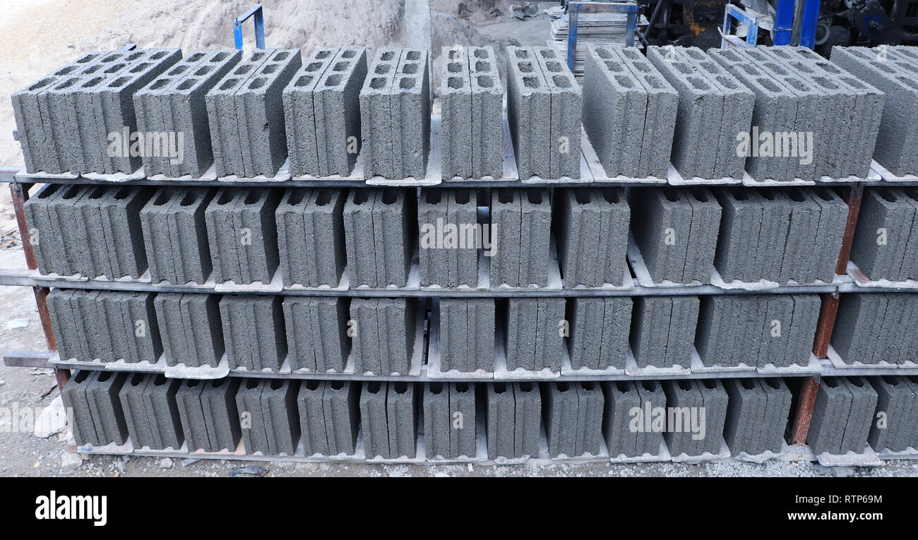 Stacking of concrete blocks laying on the floor Stock Photo - Alamy