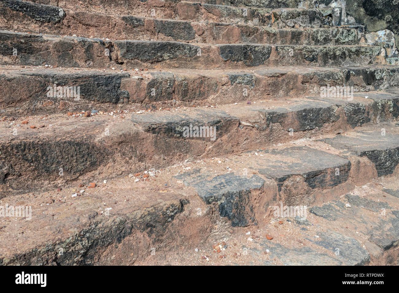 Textured stairs in old city in Sri lanka. Red earth on stair Stock ...
