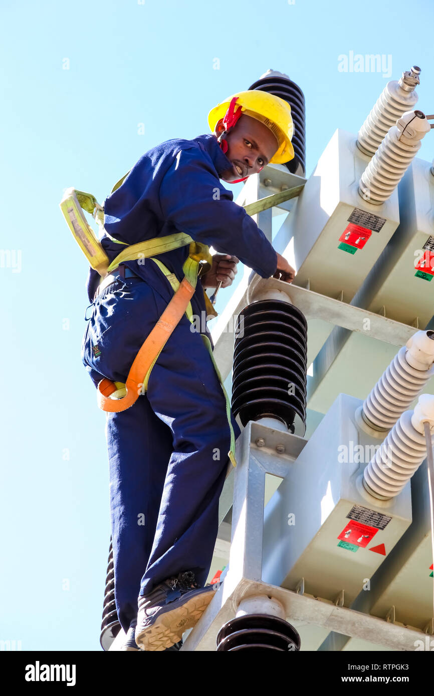 Working electricity lines africa hi-res stock photography and images ...