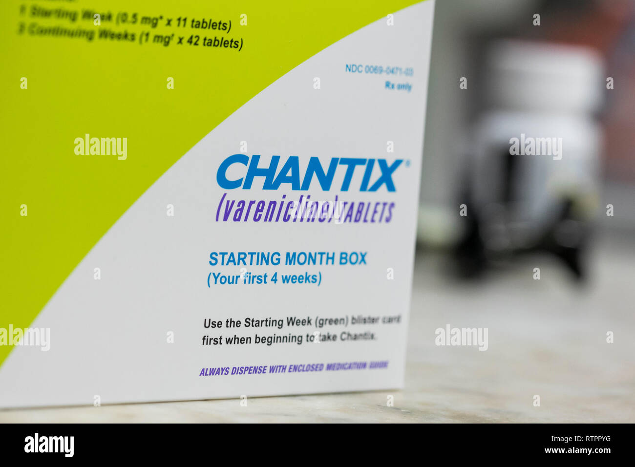 A box of Chantix (varenicline) prescription pharmaceuticals photographed in a pharmacy Stock ...