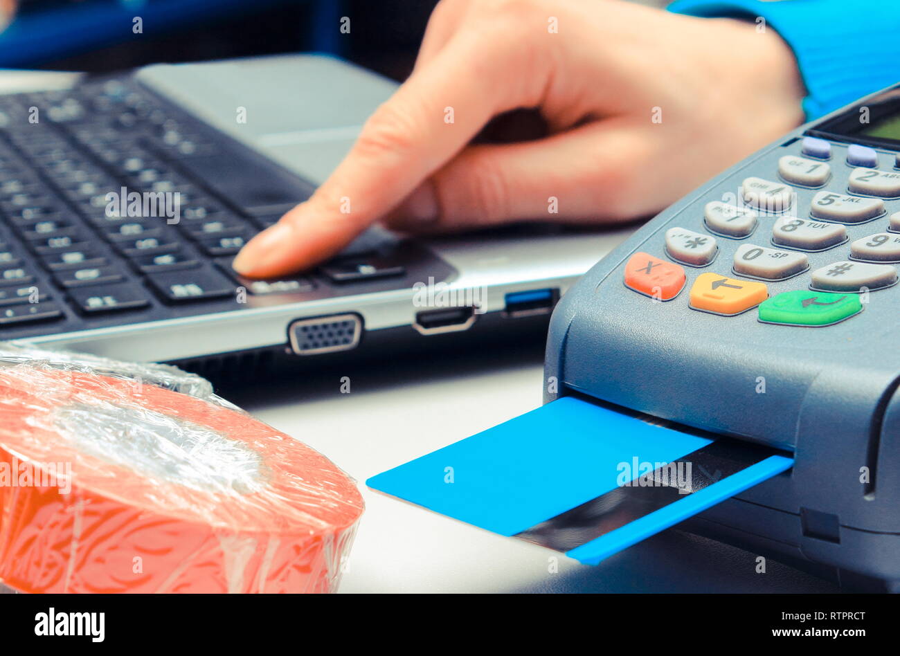 Using payment terminal in electrical shop, paying with credit card for ...
