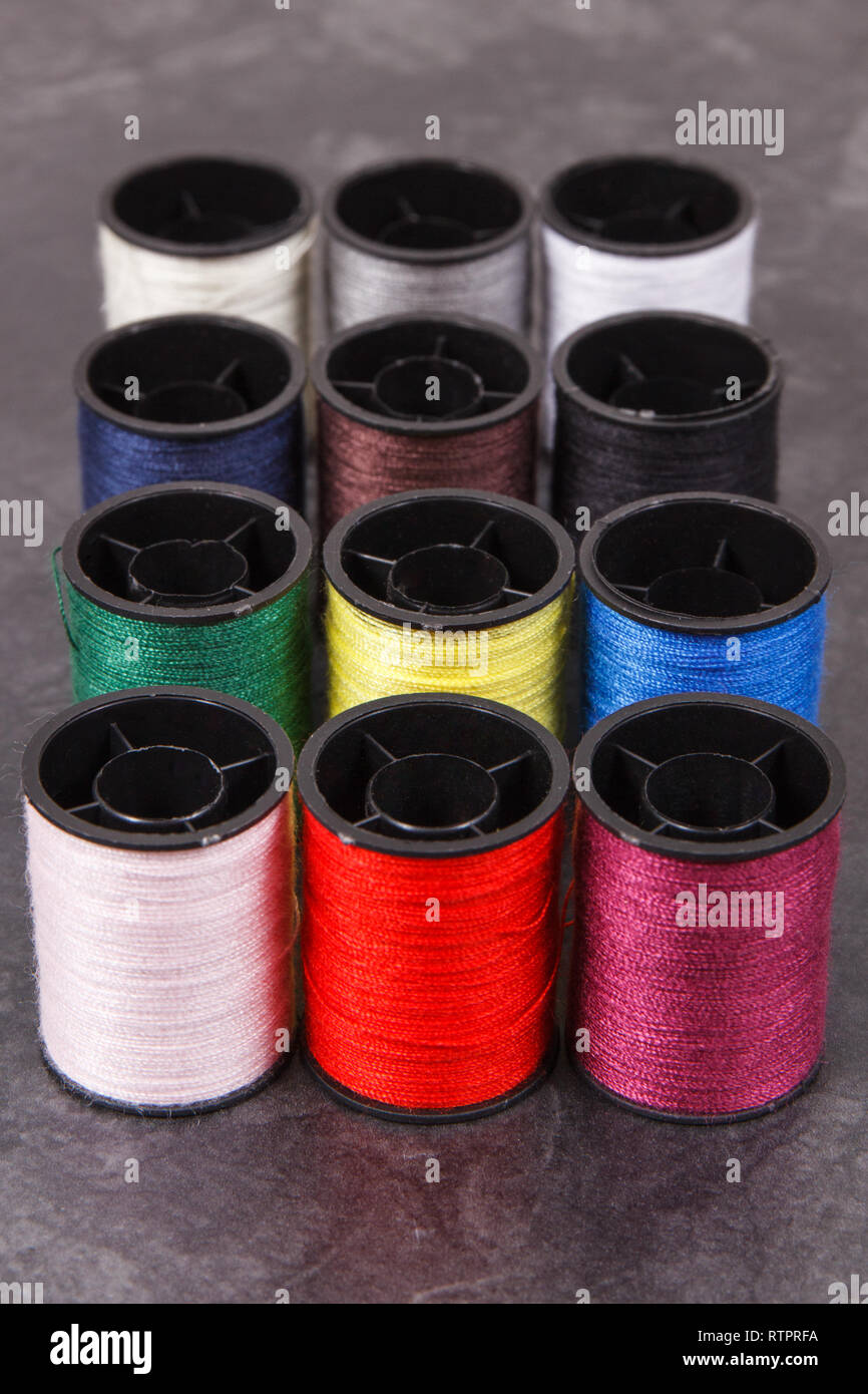 Spool of dark blue cotton hi-res stock photography and images - Alamy
