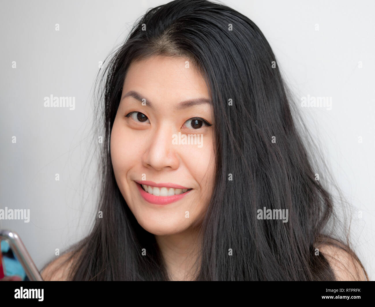 Excited Young Asian Beautiful Woman Amazed By Unbelievable Shopping