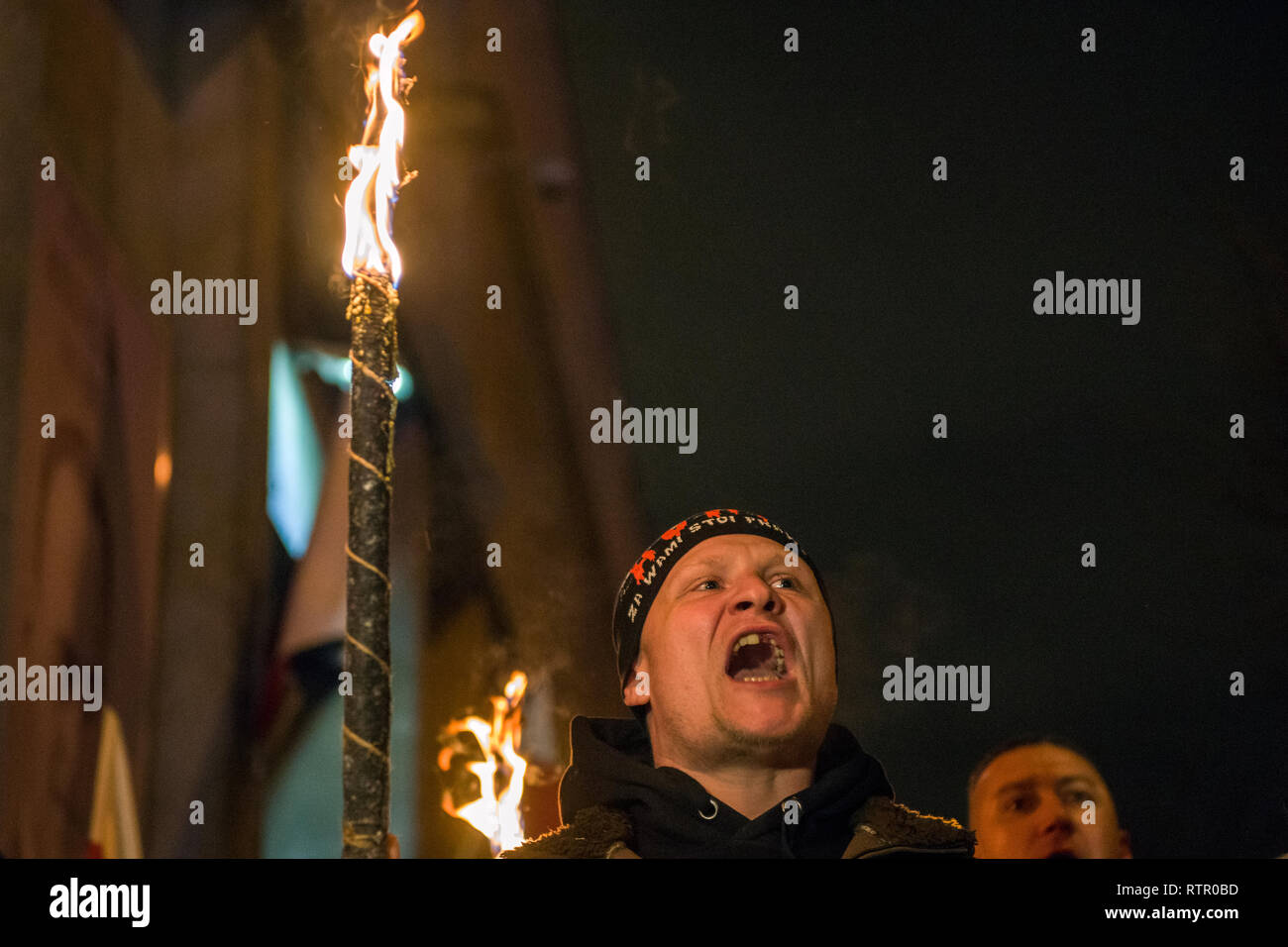 A Nationalist seen holding torches and shouting slogans during the ...