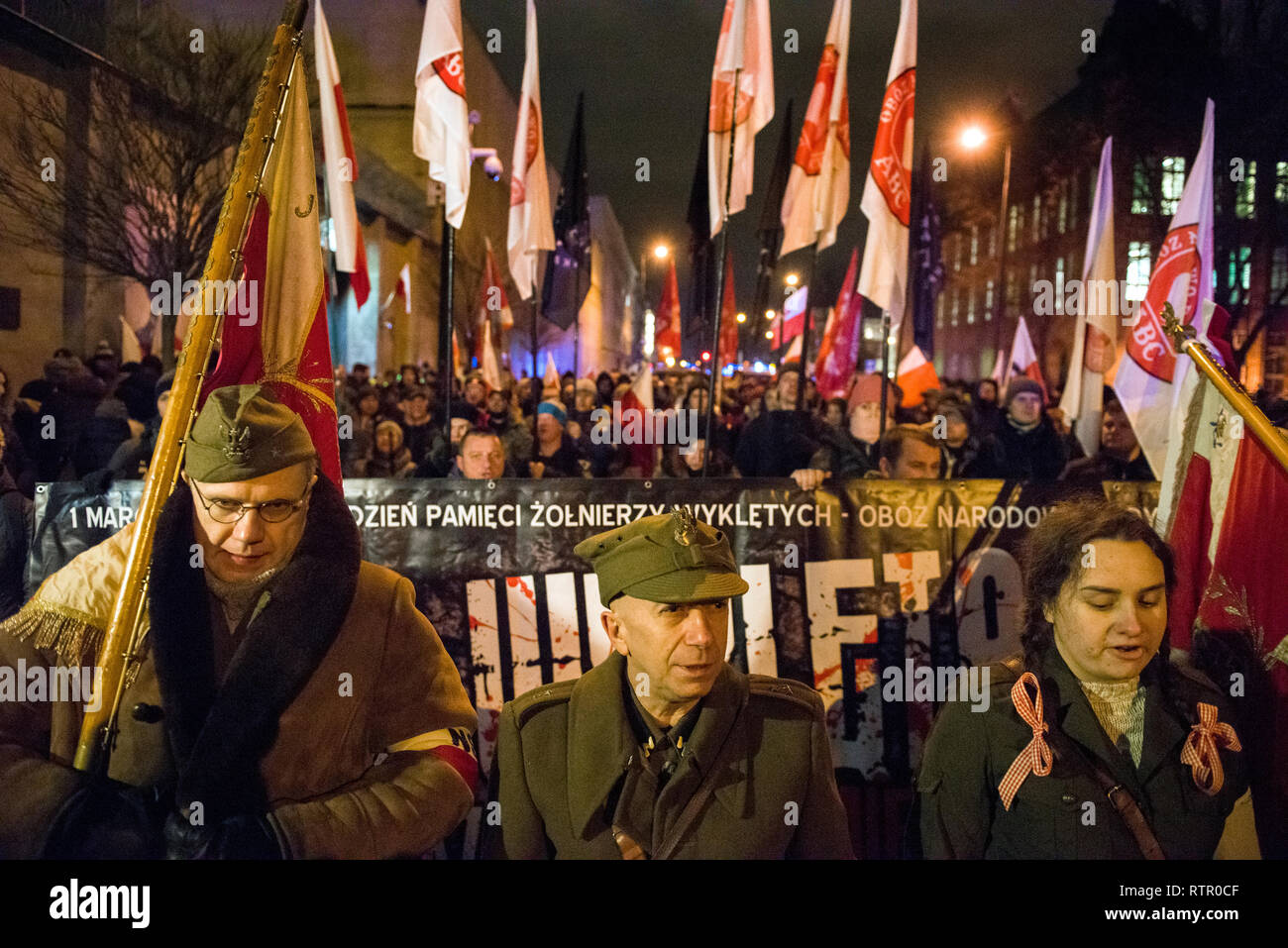 Nationalists seen with banners and flags during the commemorative march ...
