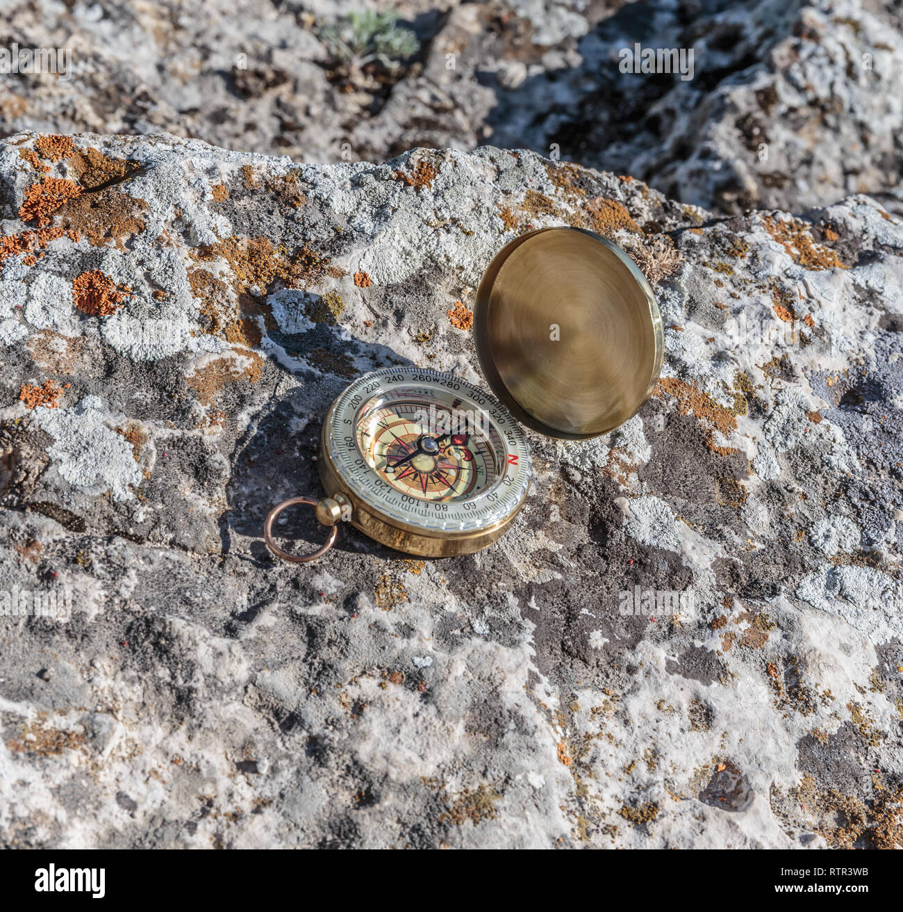 Compass on rock hi-res stock photography and images - Alamy